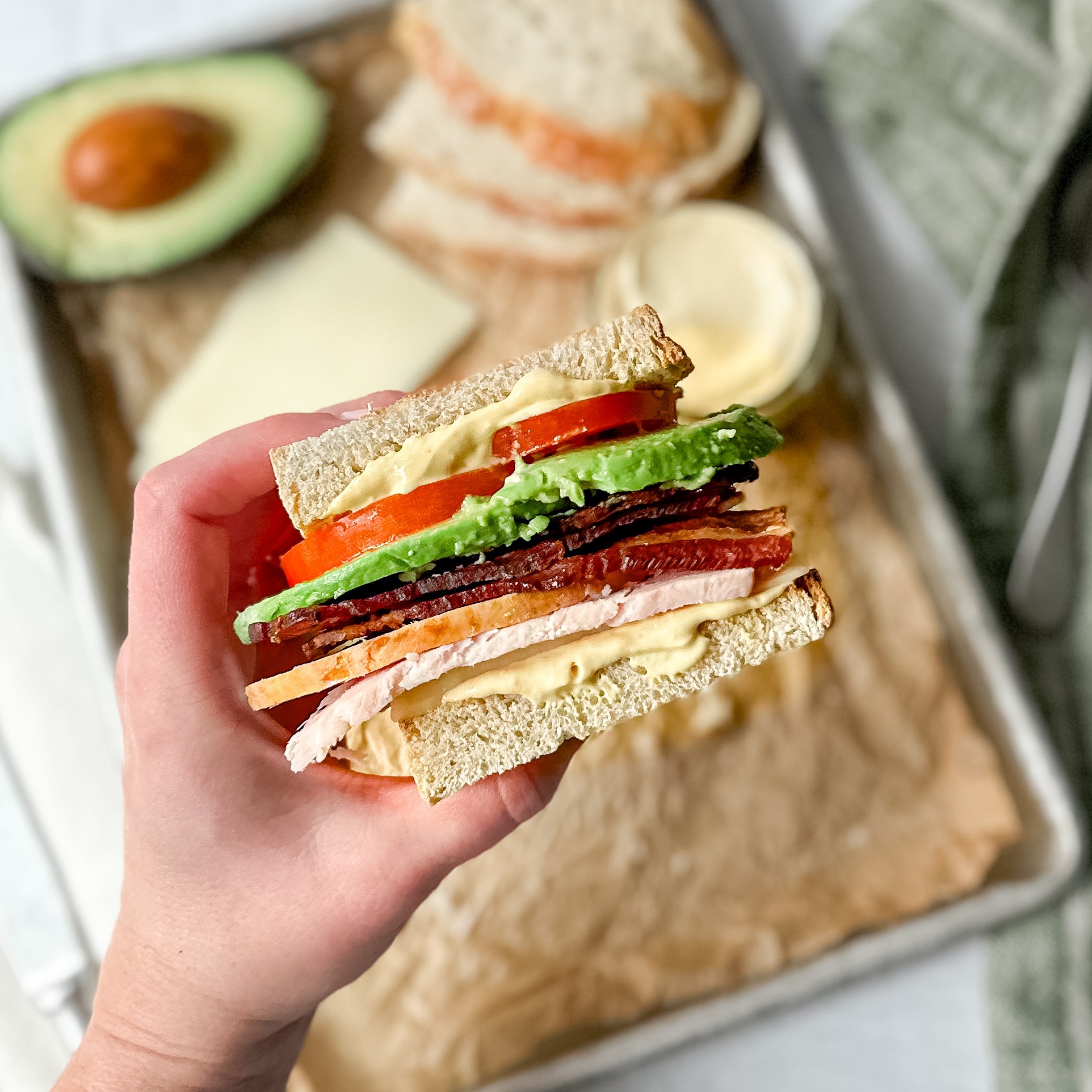 Turkey Bacon Avocado Club Sandwich with Kneaders Sauce - Plum Street Collective